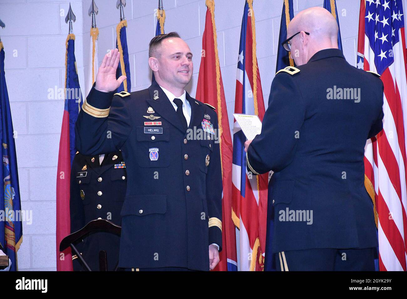 Brig. Gen. Jered P. Helwig receives the oath of office from Maj. Gen ...