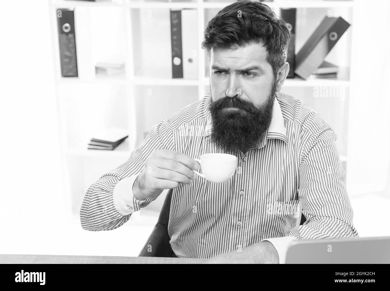 Getting hot drink. Tired employee drink coffee in workplace. Healthy ...