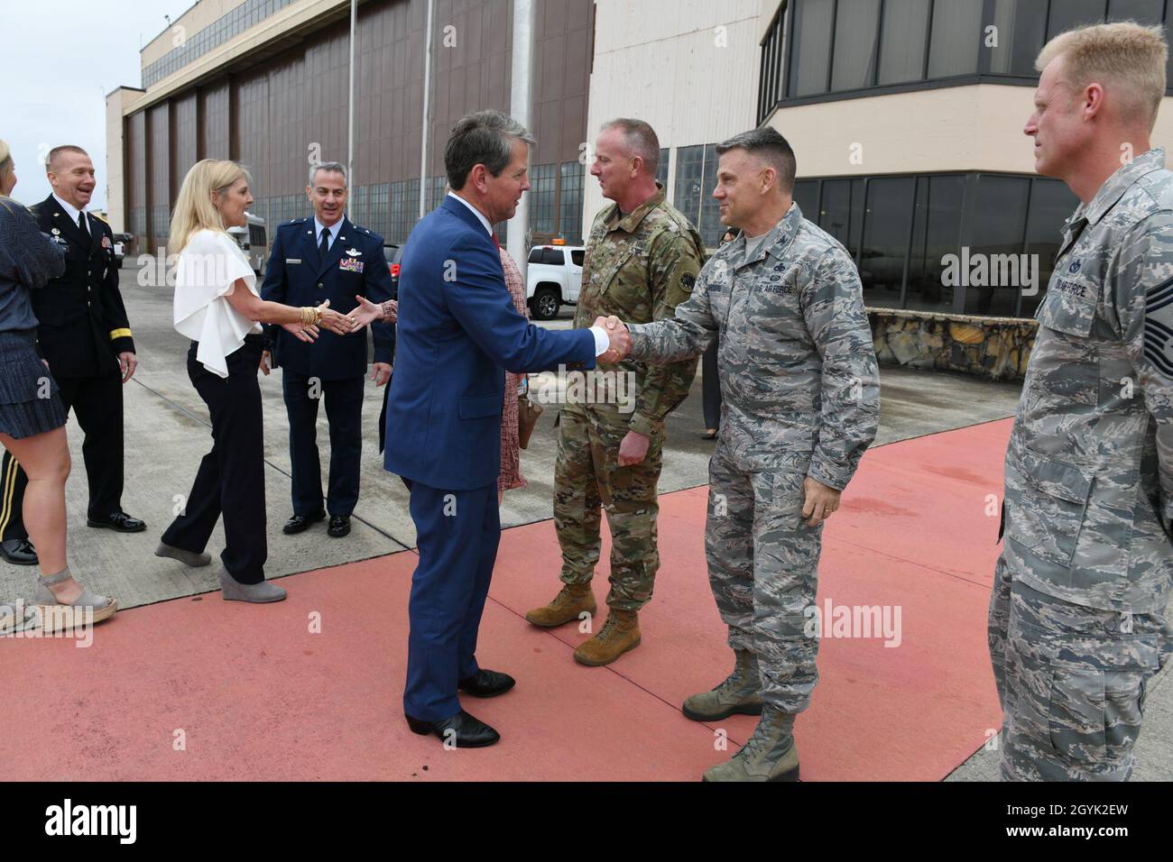 Georgia Gov. Brian Kemp is welcomed by Col. Brian Moore, Robins ...