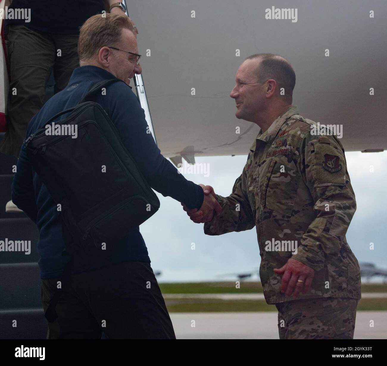 Acting Secretary of the Navy Thomas Modly (left), is greeted by ...