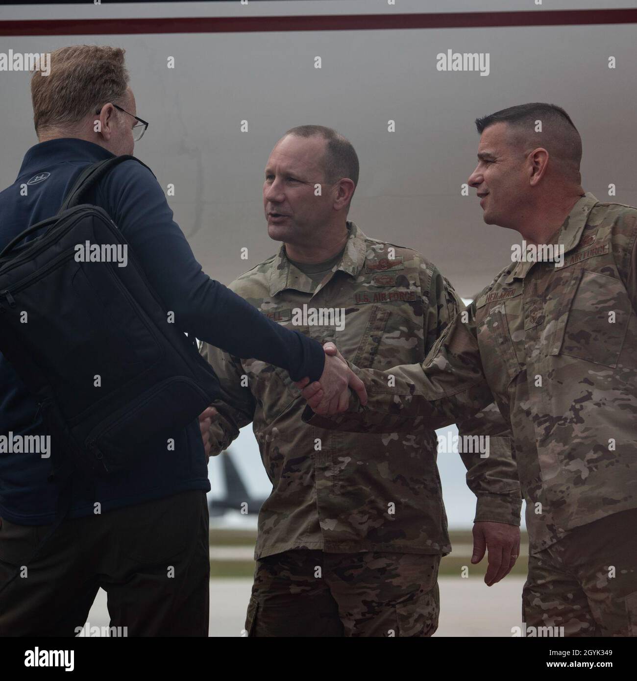 Acting Secretary of the Navy Thomas Modly (left) is greeted by ...