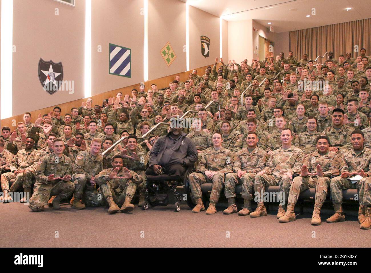 Retired Col. Gregory Gadson, center, poses among the Vanguard Battalion ...