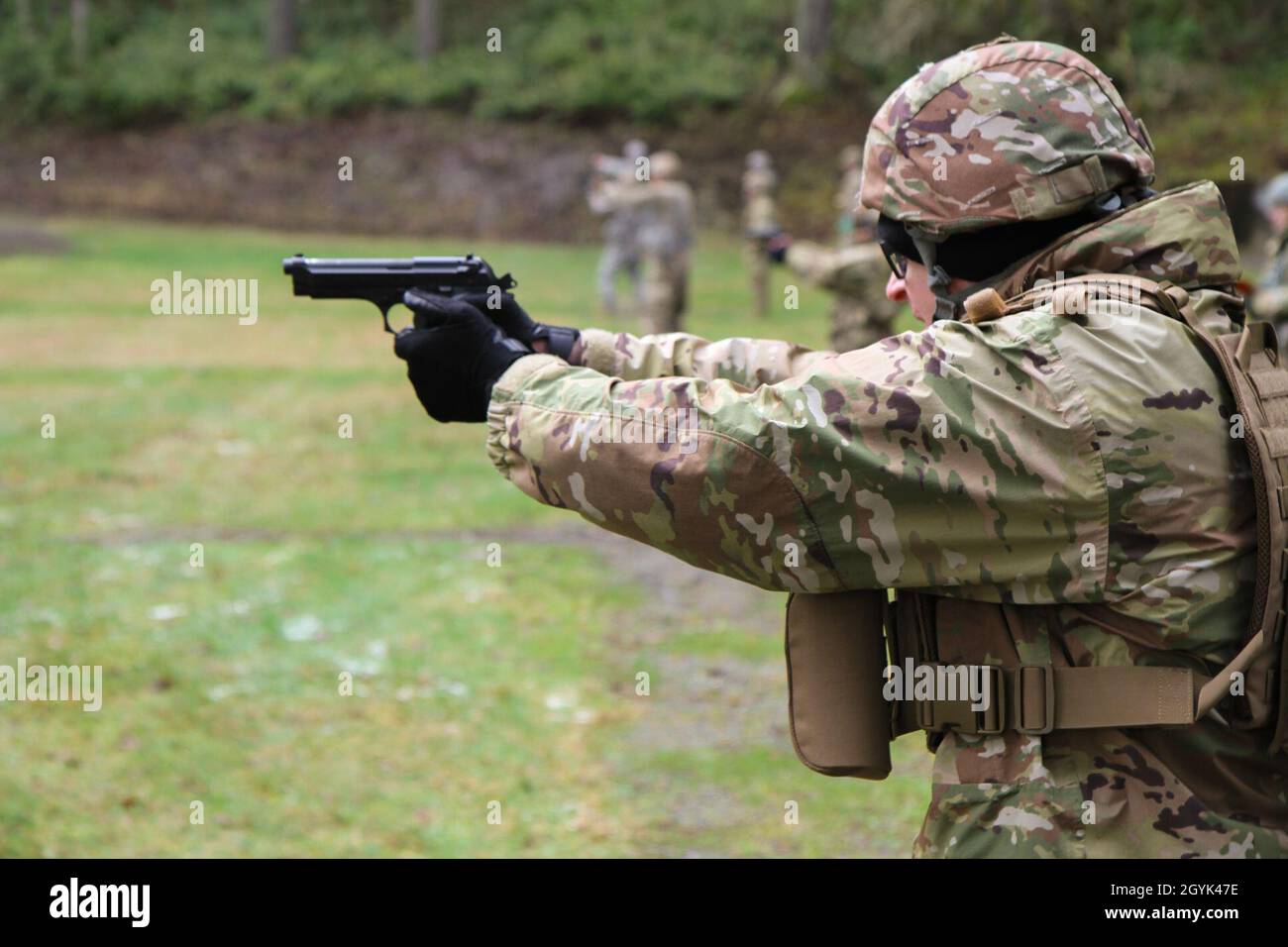 A United States Army Reserve Legal Command Soldier fires at a target ...