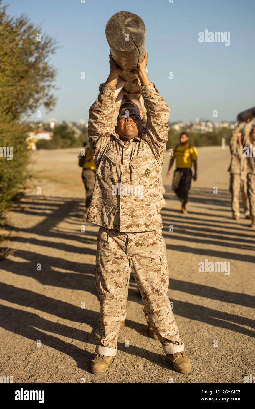 A recruit with Echo Company, 2nd Recruit Training Battalion, lifts a ...