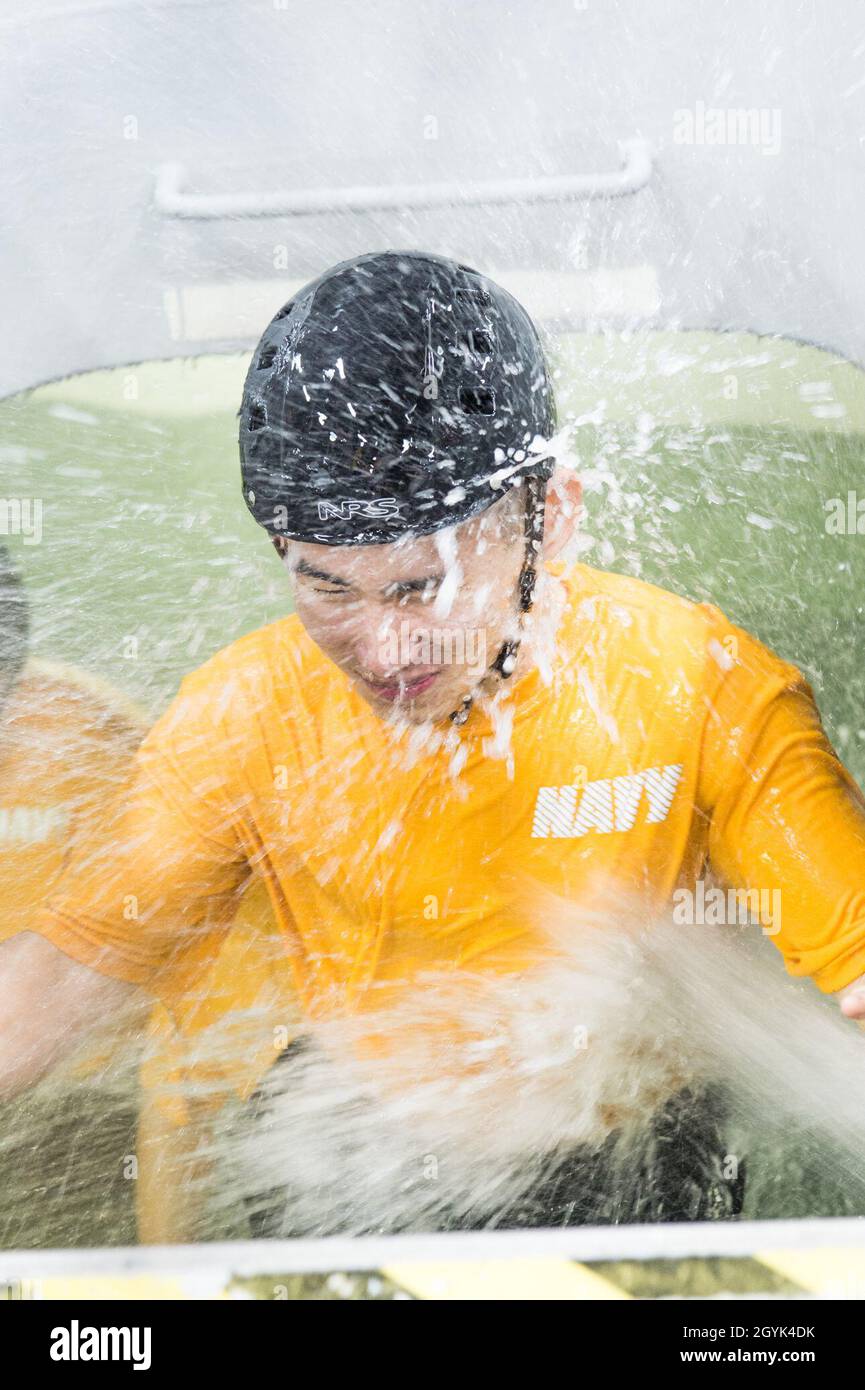 A student with Officer Candidate School (OCS) class 06-20 at the USS ...