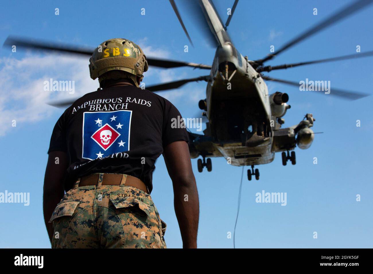 A U.S. Marine with III MEF, Expeditionary Operations Training Group ...