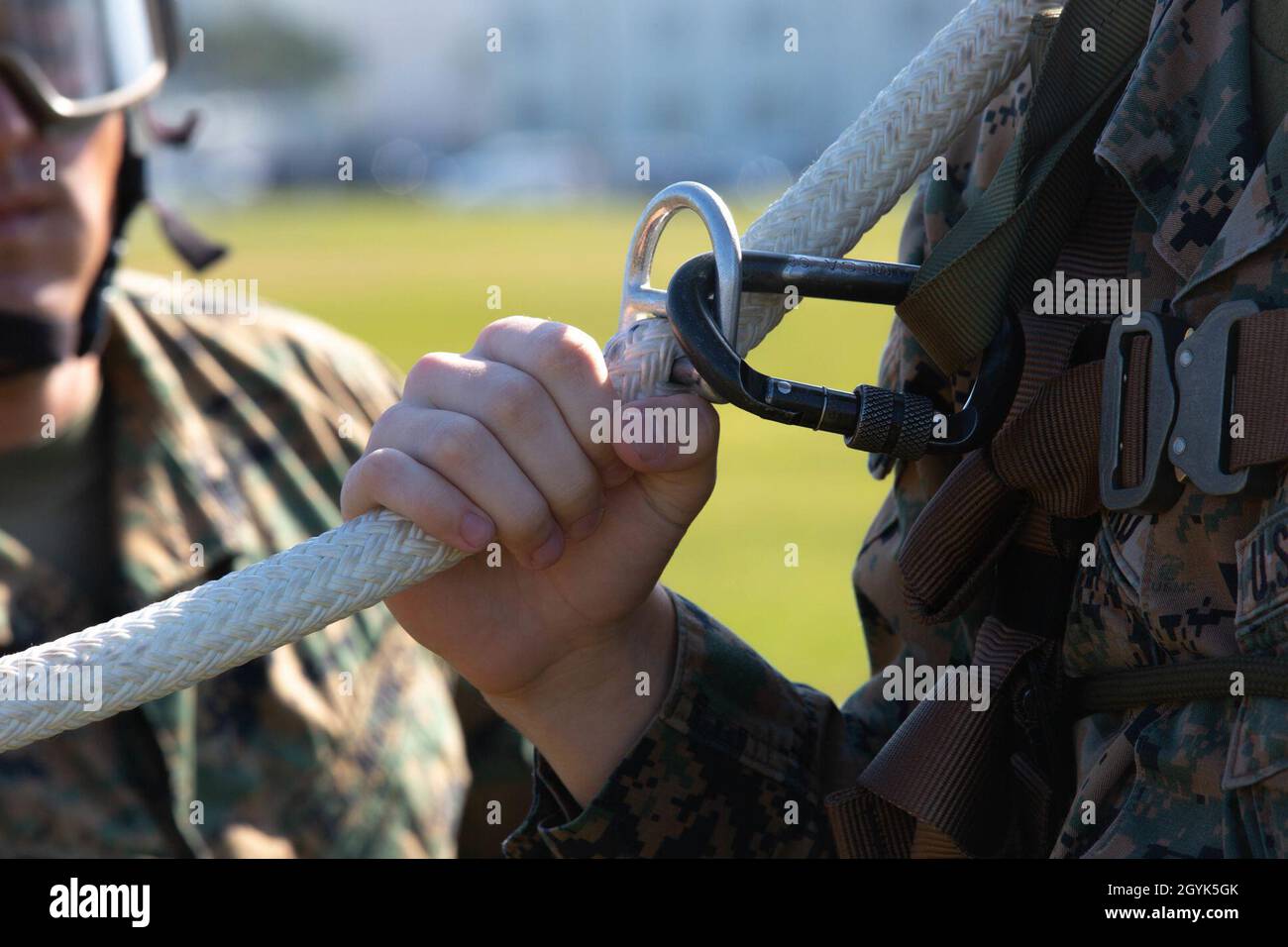 U.S. Marines with 12th Marine Regiment, 3rd Marine Division receive one ...