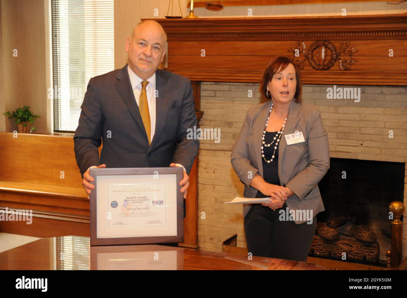 Laurie Silvey gives a brief speech thanking Joseph D. Murphy for his ...