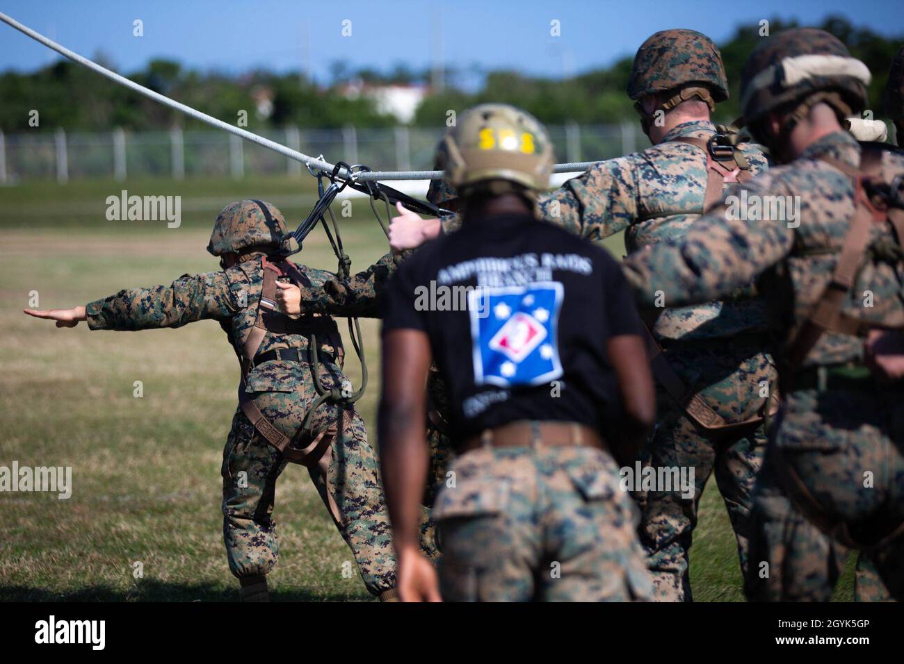 U.S. Marines with 12th Marine Regiment, 3rd Marine Division conduct a ...