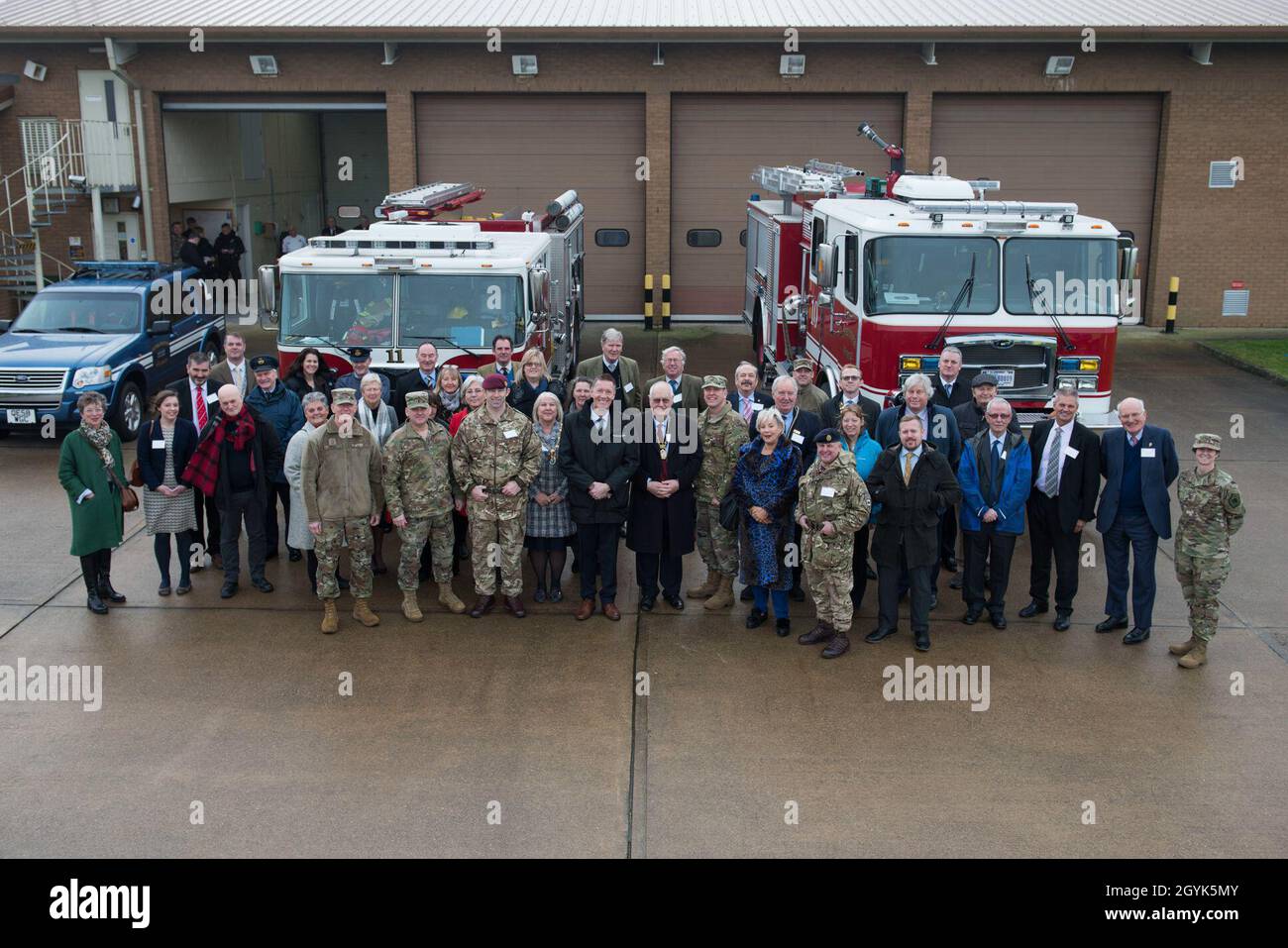 U.S. Air Force military members, civilians and local civic leaders pose ...