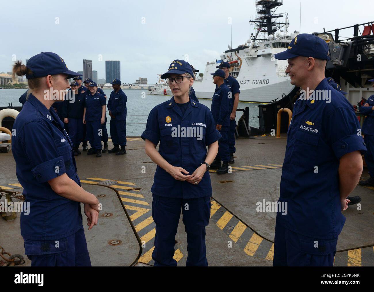The crew of the Coast Guard Cutter Walnut (WLB 205) prepares to depart ...