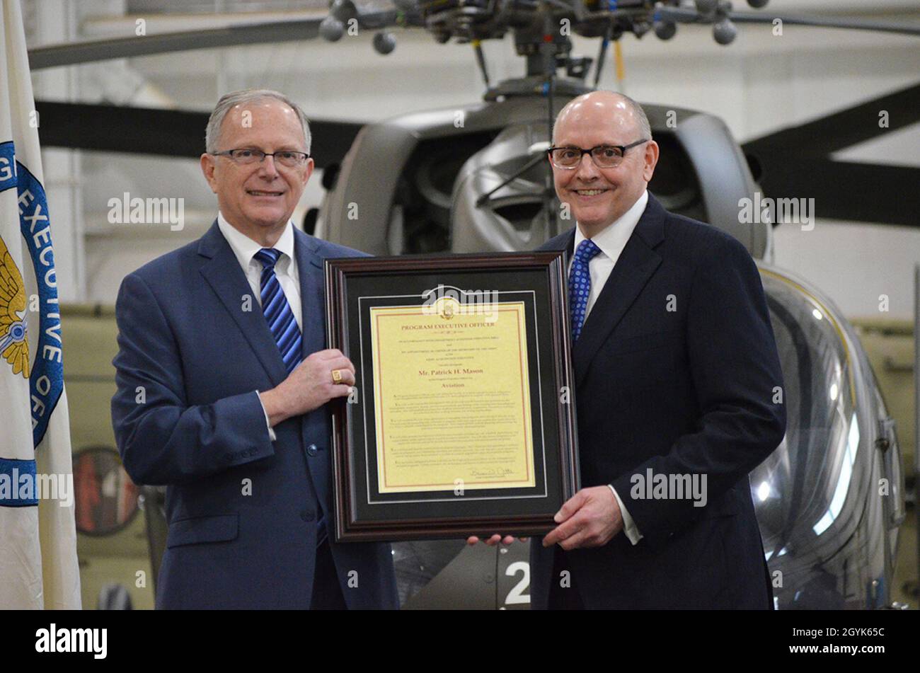Patrick Mason accepts the Program Executive Office for Aviation charter ...