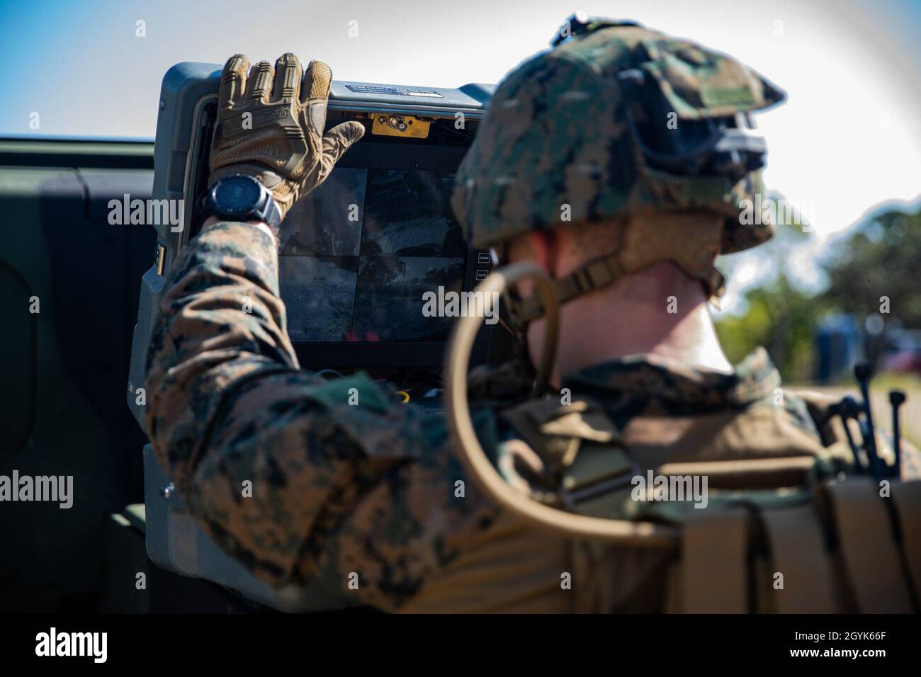 U.S. Marine Corps Sgt. Demetri X. Duey operates a Mark II Talon ...