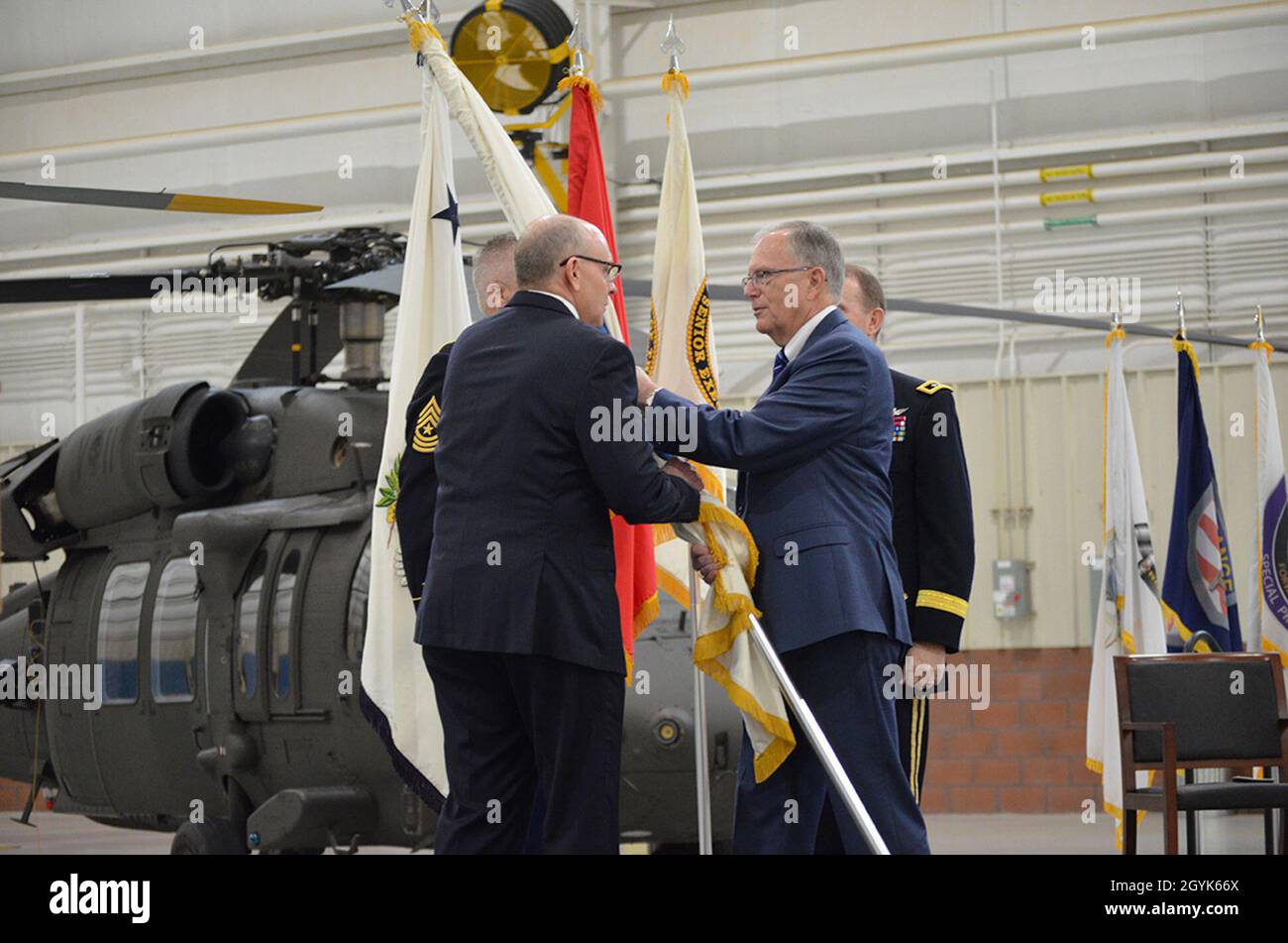 Patrick Mason accepts the Program Executive Office for Aviation guidon ...