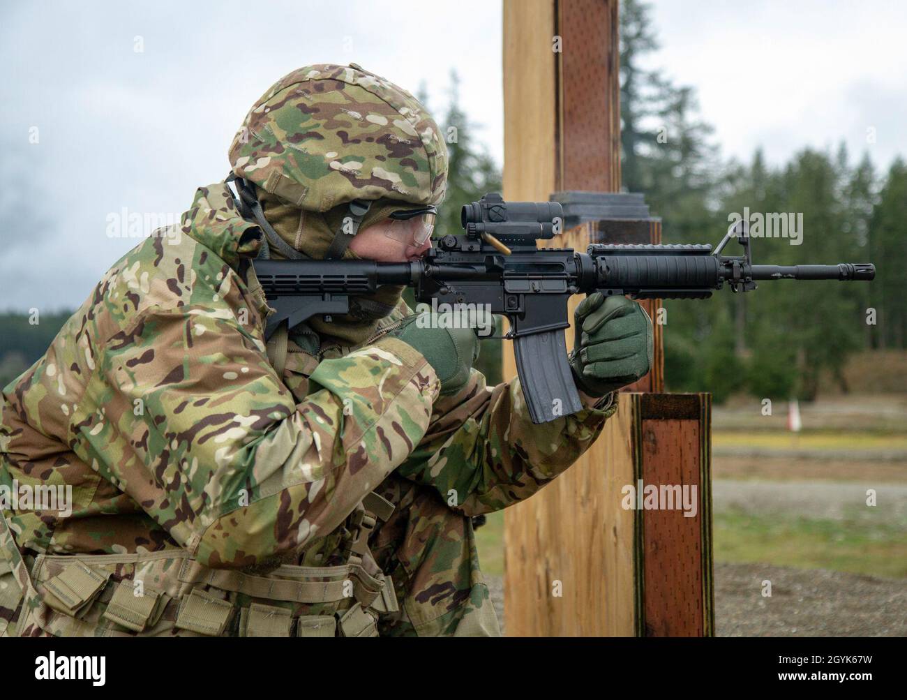 A United States Army Reserve Legal Command Soldier fires at a target ...