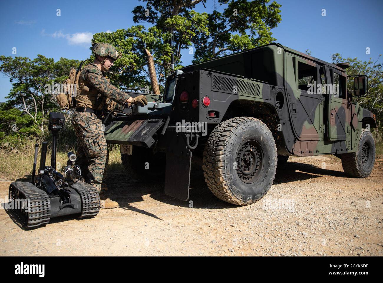 U.S. Marine Corps Sgt. Demetri X. Duey operates a Mark II Talon ...