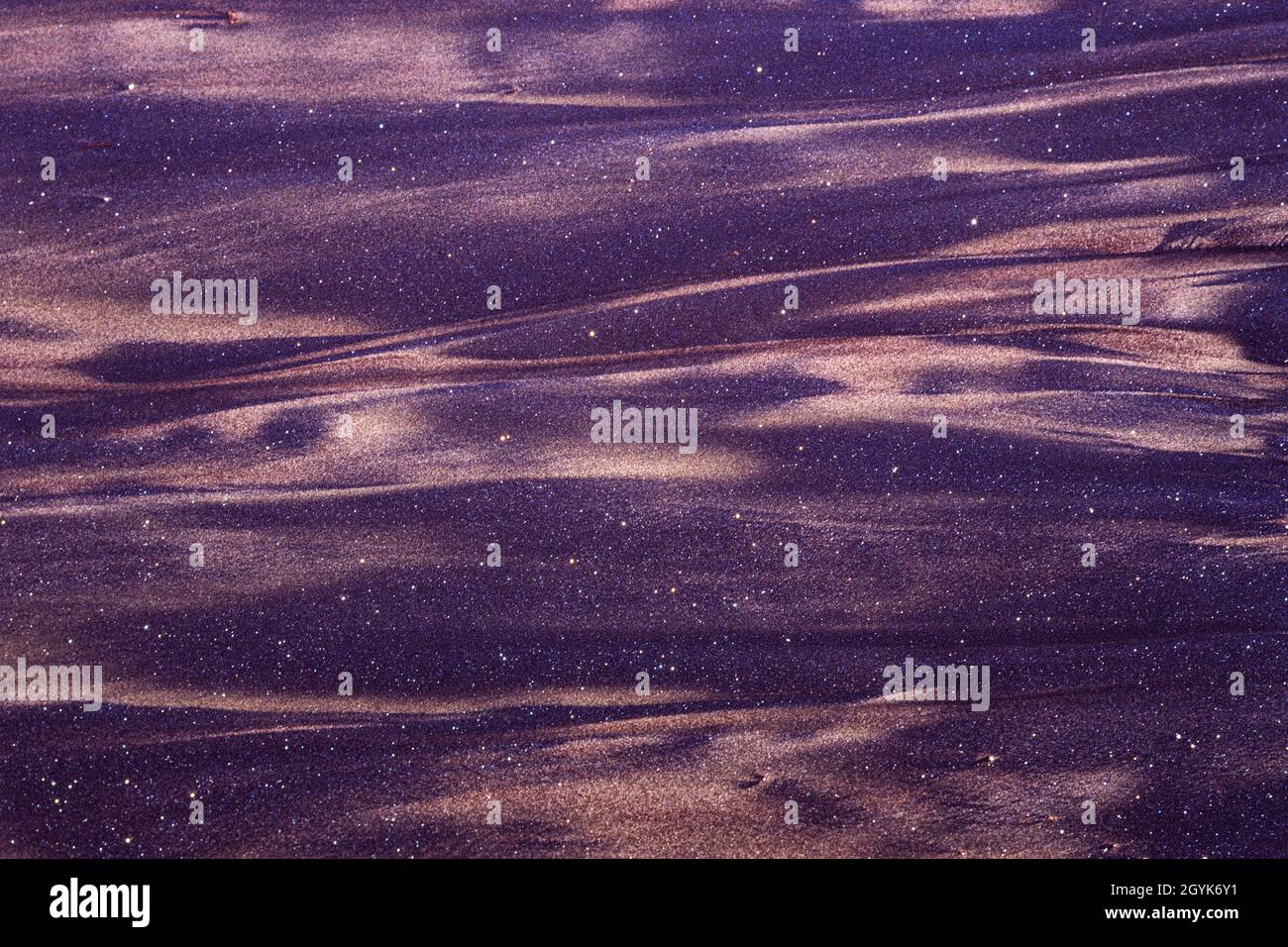 Detail of the black sand on Talofofo Beach on the island of Guam in the ...