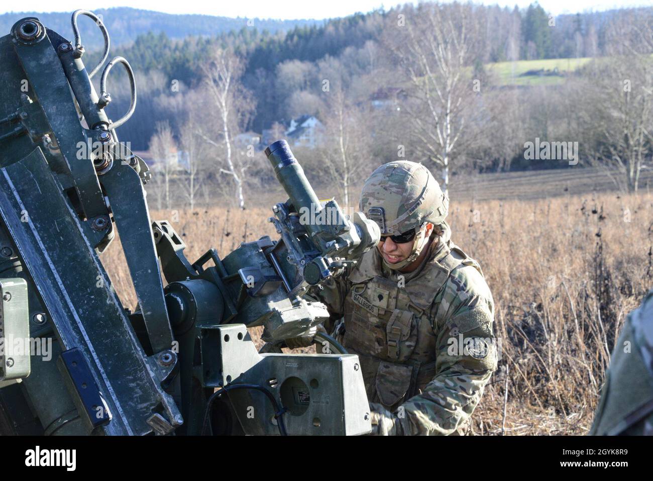 U.S. Army Spc. Gabriel Gallegos, assigned to the Bravo Battery, Field Artillery Squadron, 2nd ...