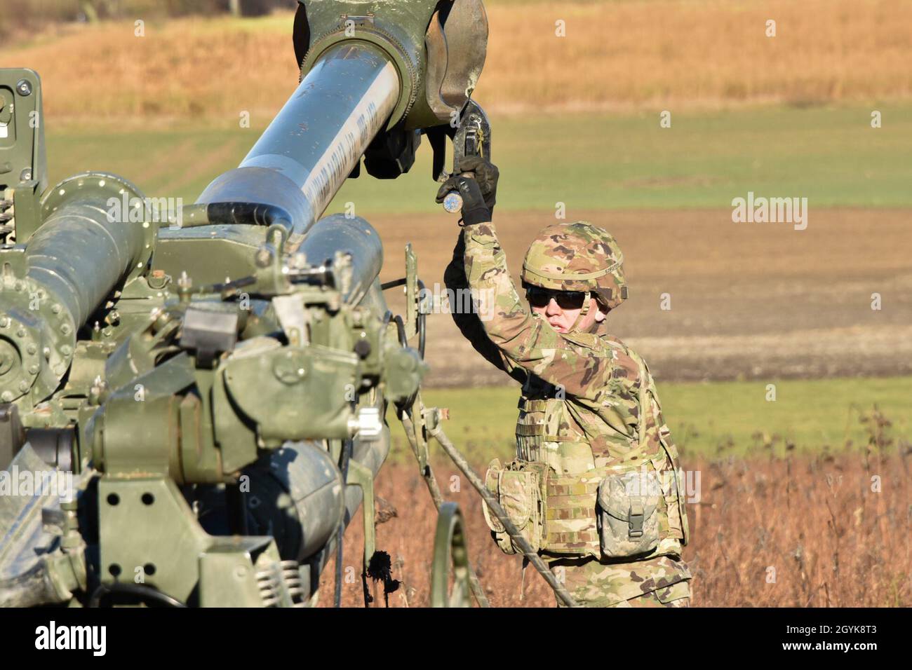 A U.S. Soldier assigned to the Bravo Battery, Field Artillery Squadron, 2nd Cavalry Regiment ...