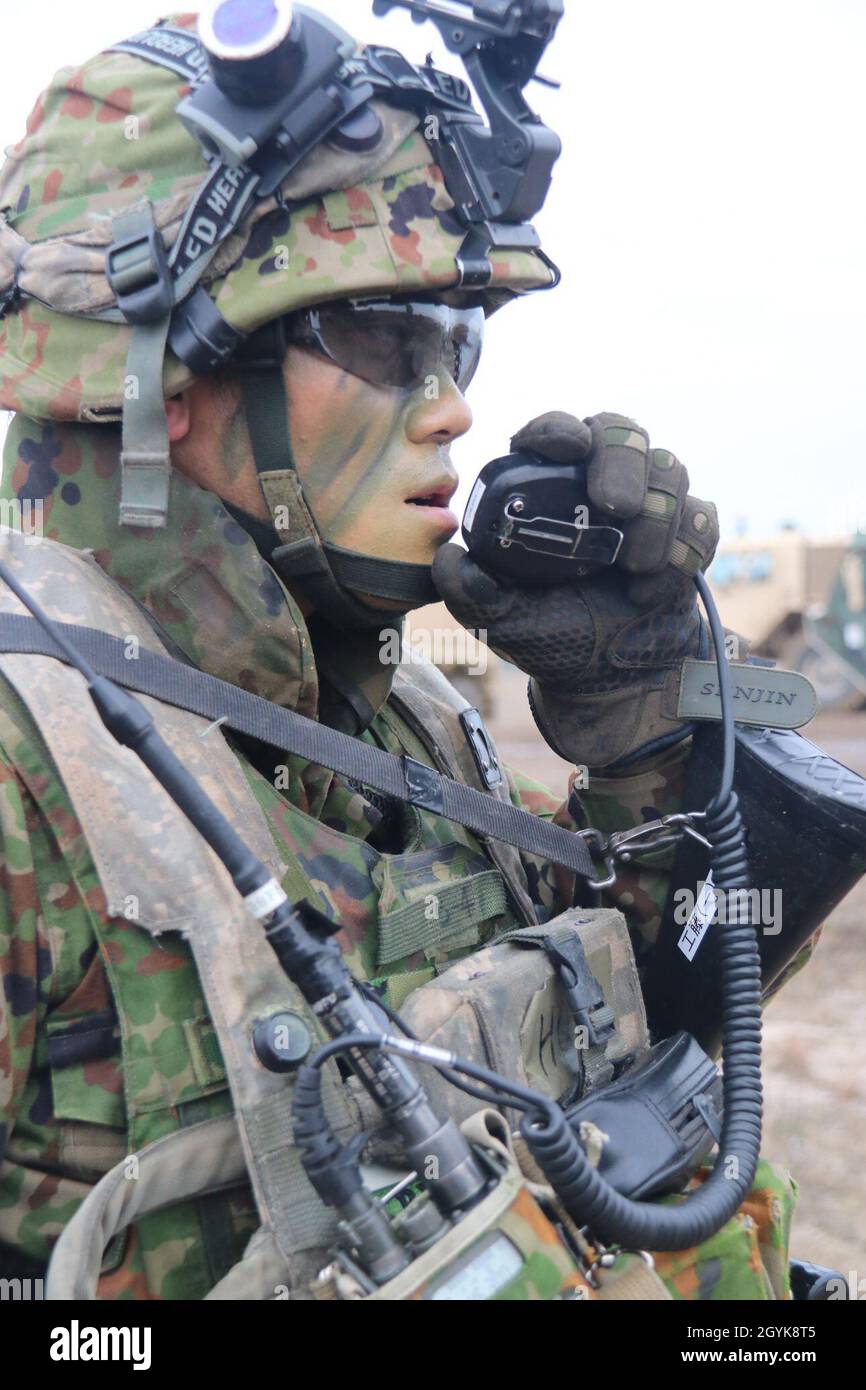 Members of the Japanese Ground Self Defense Forces are training with ...