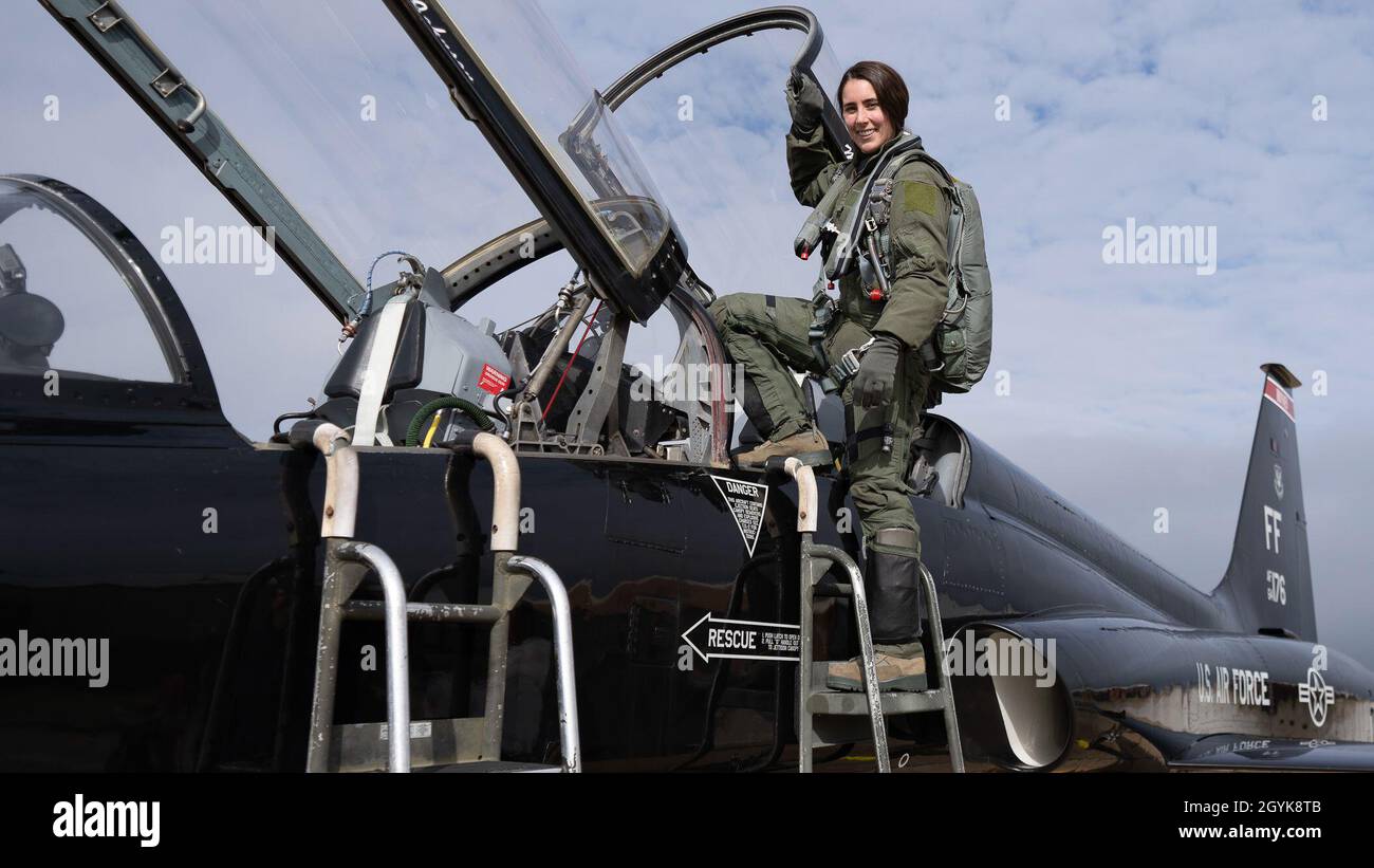 Madeline Schmitt, local news reporter, disembarks from a 71st Fighter ...