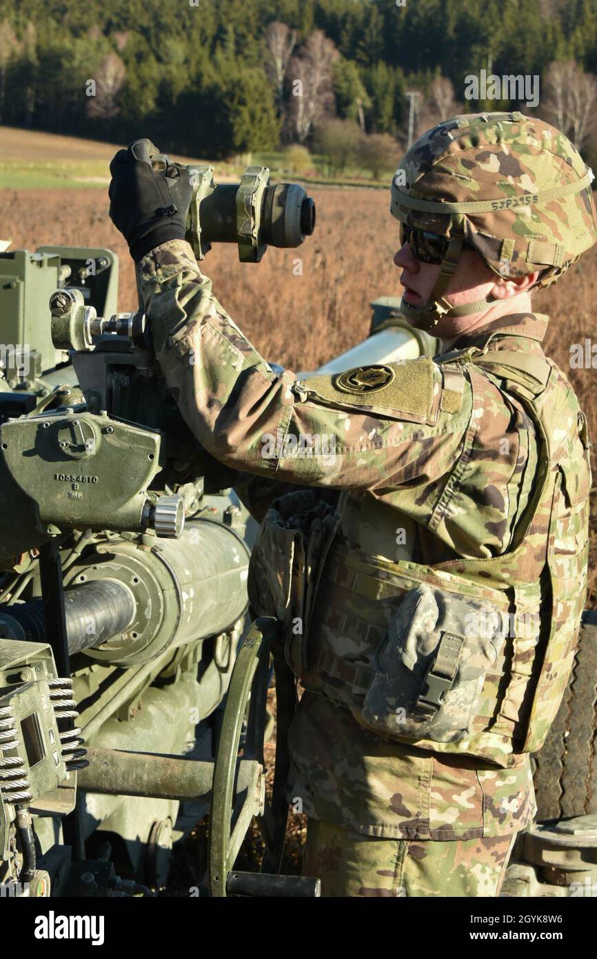 A U.S. Soldier assigned to the Bravo Battery, Field Artillery Squadron, 2nd Cavalry Regiment ...