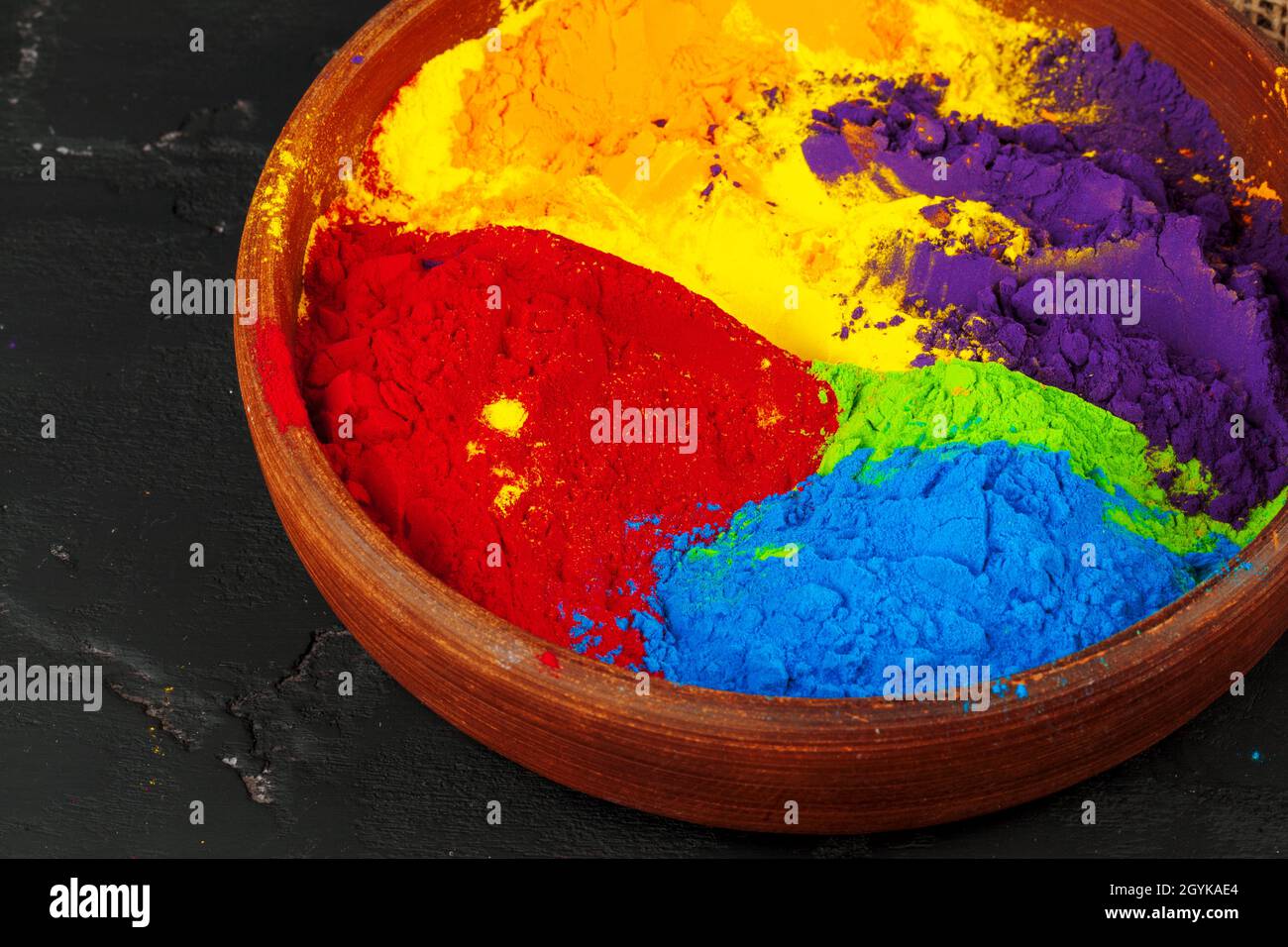 Indian Holi festival colours in small bowls on dark background Stock ...