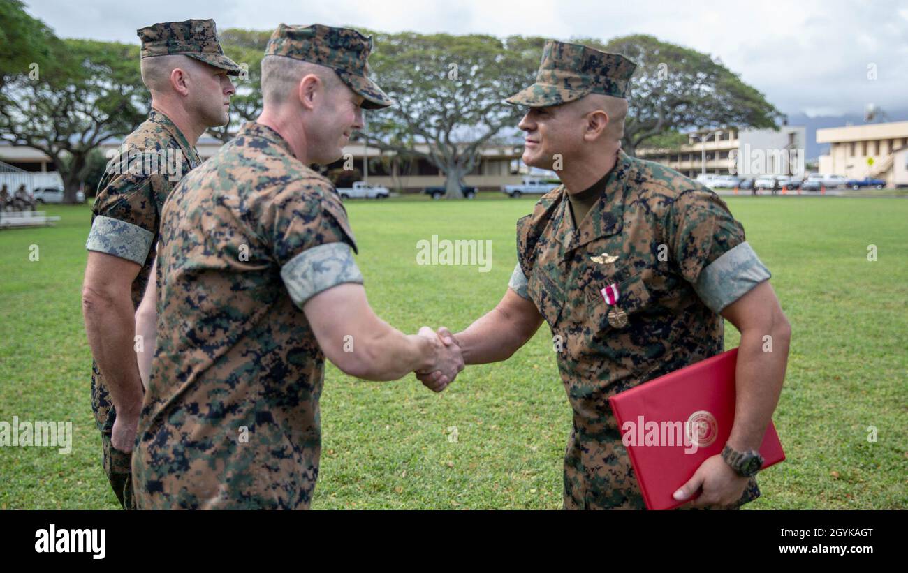 U.S. Marine Corps Sgt. Maj. Jose Romero, offgoing sergeant major, with ...