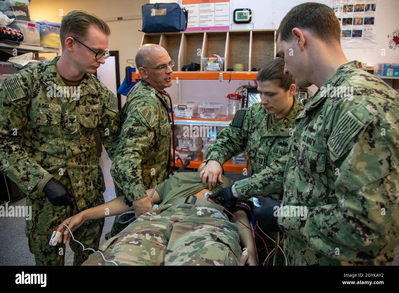 U.S. Sailors deployed from Naval Hospital Jacksonville, Florida, gather ...