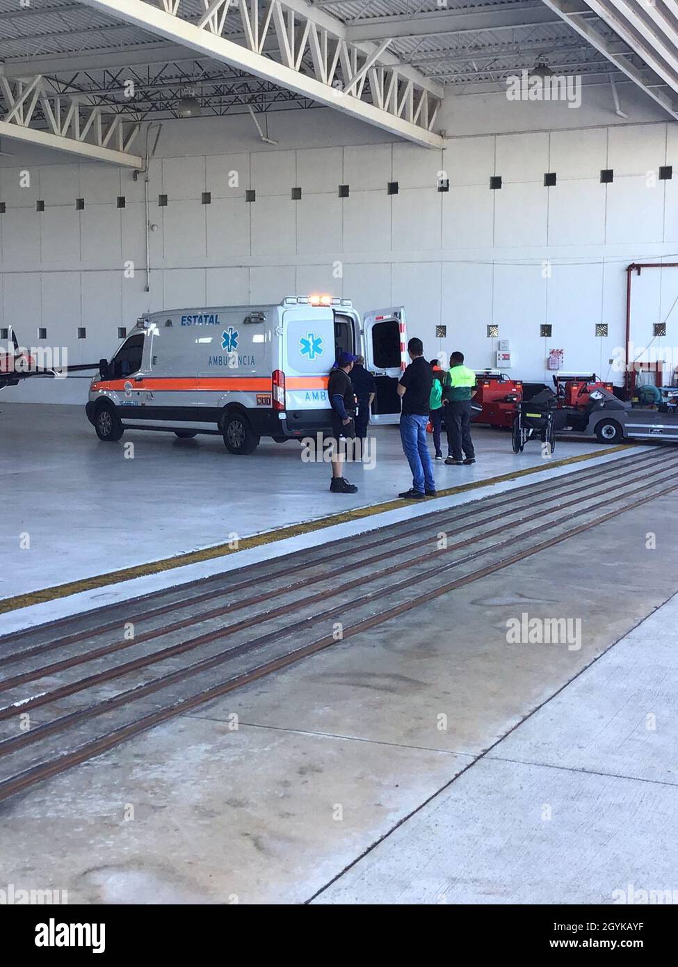 Pictured is a medical patient being transferred to emergency medical ...