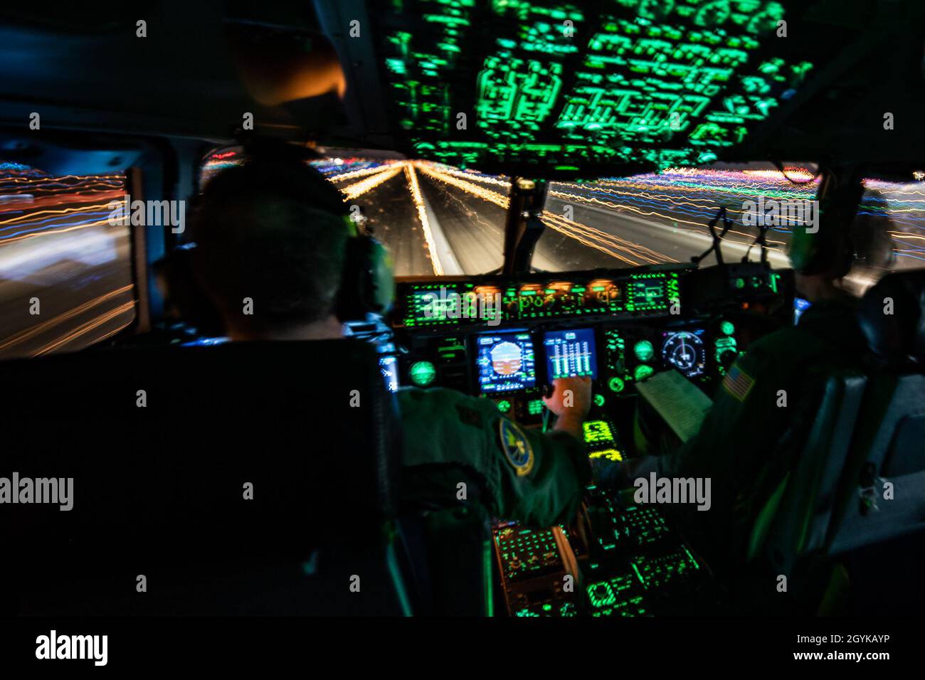 Maj. Jacob Predis, 758th Airlift Squadron pilot, and Col. John F ...