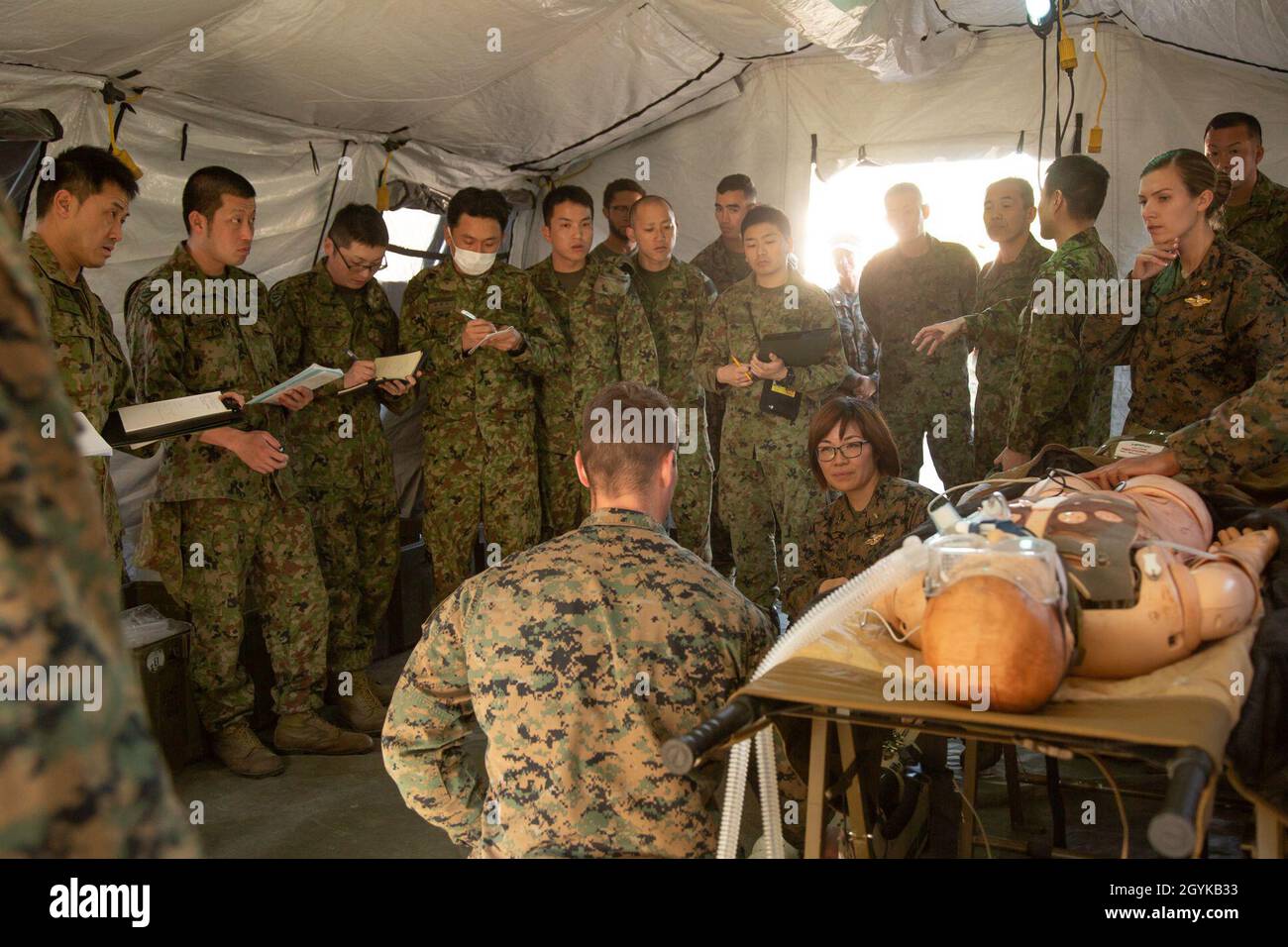 U.S. Navy Hospital Corpsman Andrew Menzel, left, an en route care ...