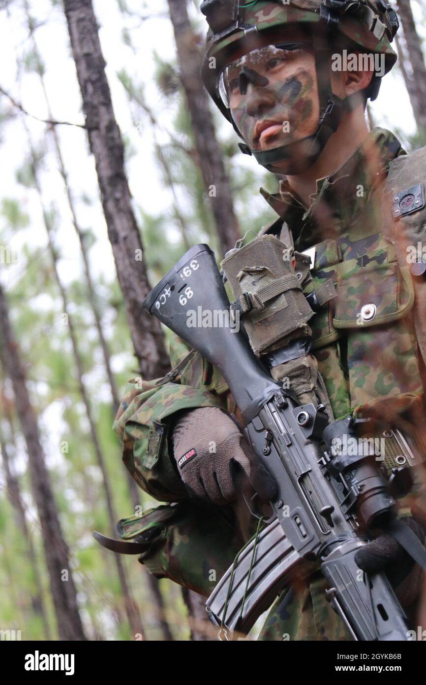 Members of the Japanese Ground Self Defense Forces are training with ...