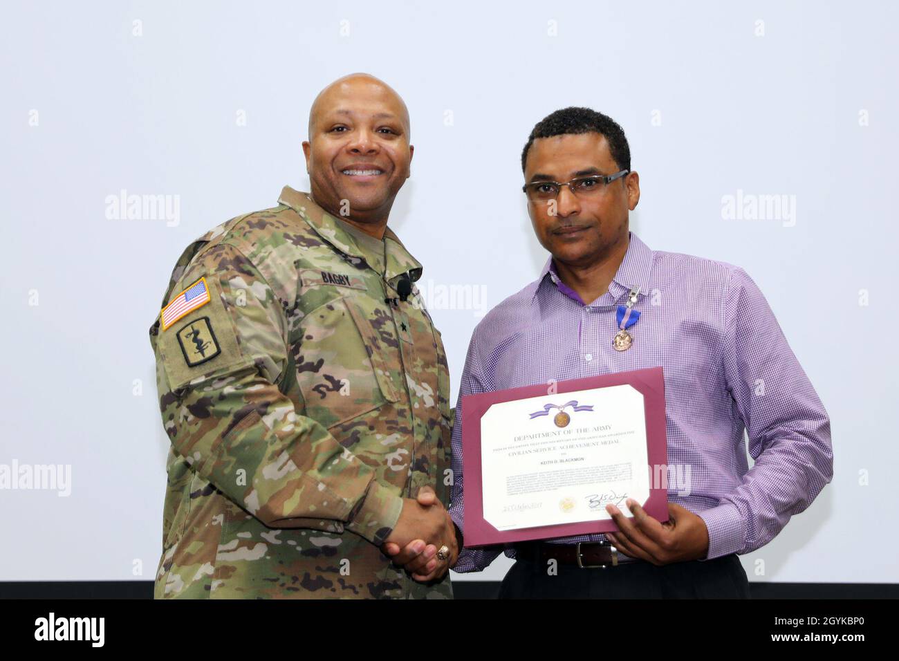 Civilian service achievement medal hi-res stock photography and images ...