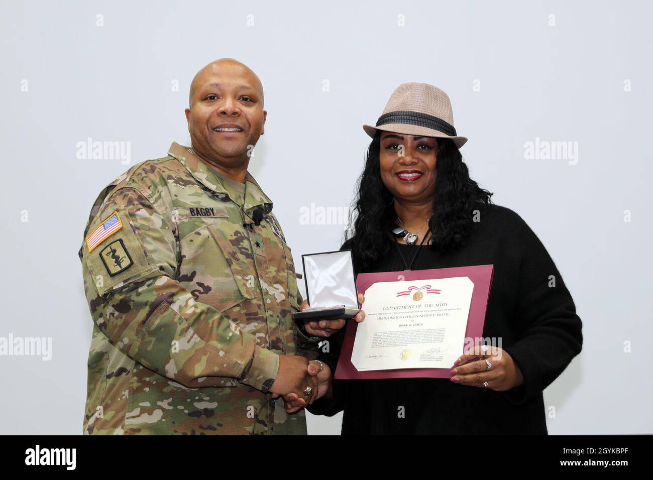 Brig. Gen. Shan K. Bagby presents an award for Brian Lynch (Posthumous ...