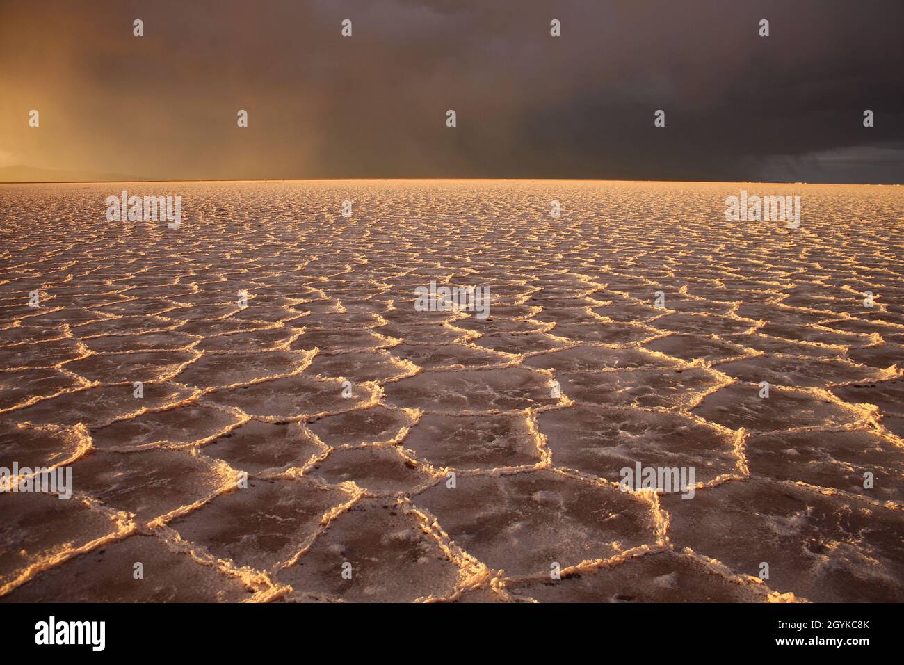 Storm at salt flat desert on sunset Stock Photo - Alamy