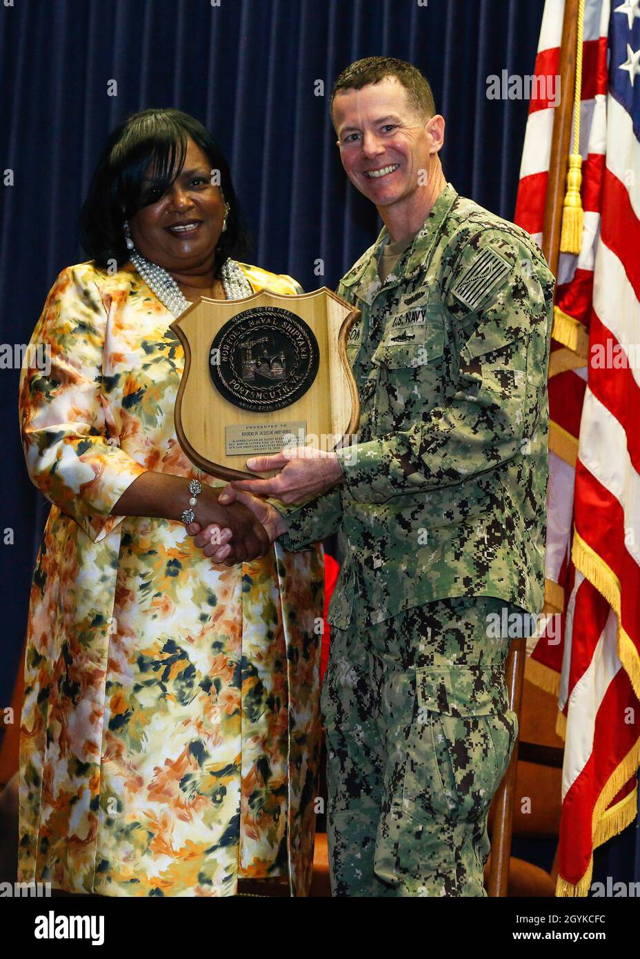 Shipyard Commander Capt. Kai Torkelson presented a plaque to Dr ...