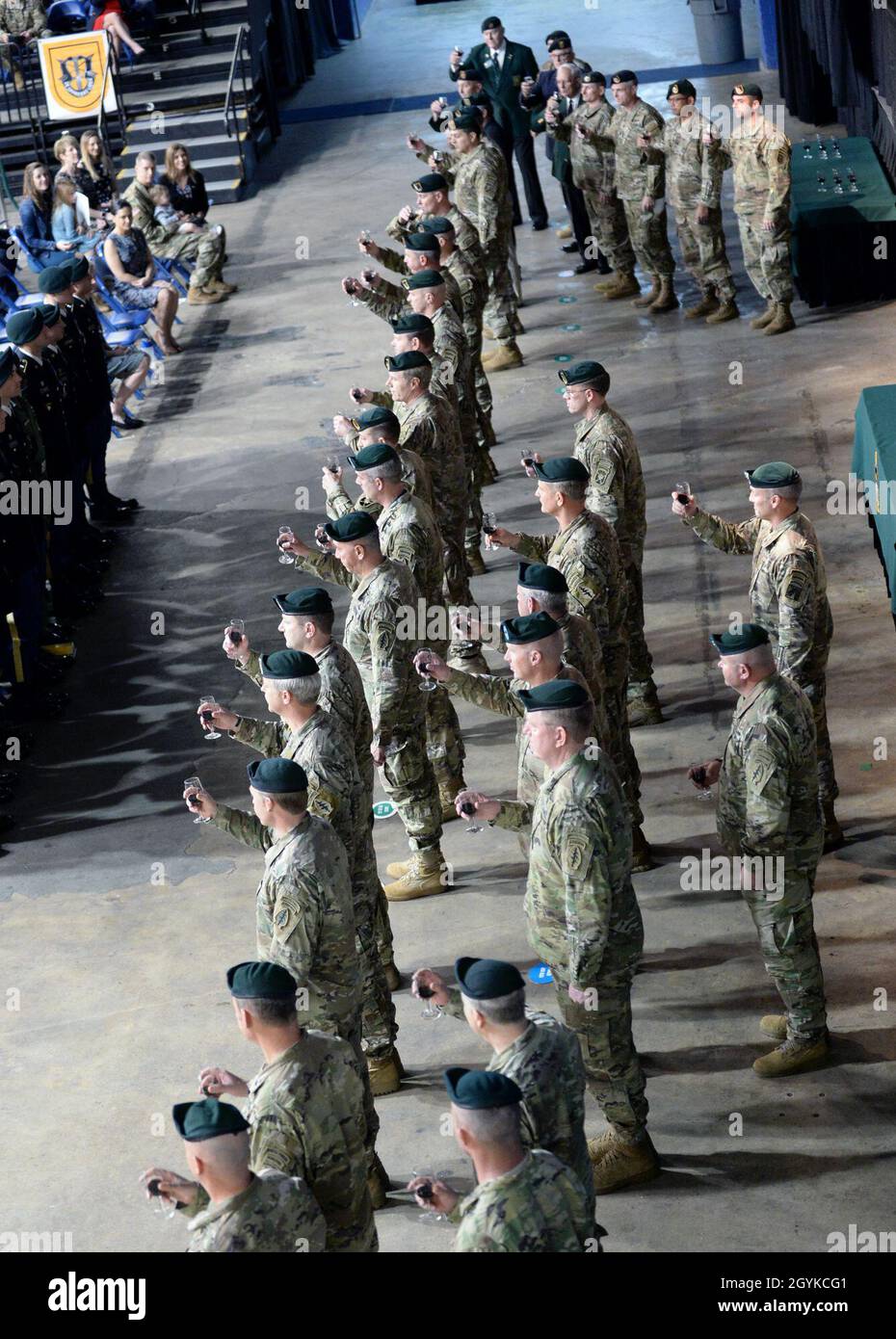 Members of the Special Forces Regiment toast graduates during a ...