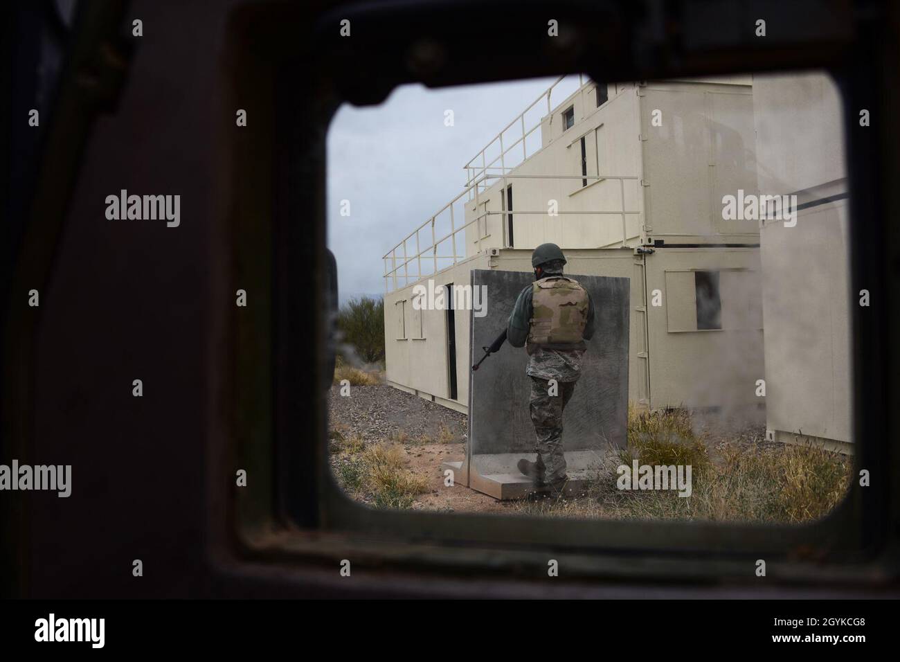 An Airman assigned to the 355th Civil Engineer Squadron stands guard ...