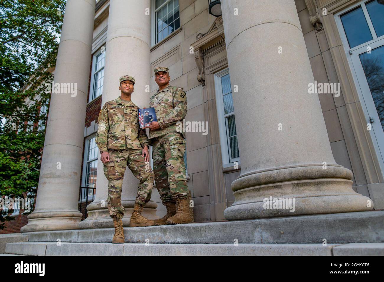 Chief Warrant Officer 4 Phillip Brashear (right), a U.S. Army Reserve command chief warrant ...