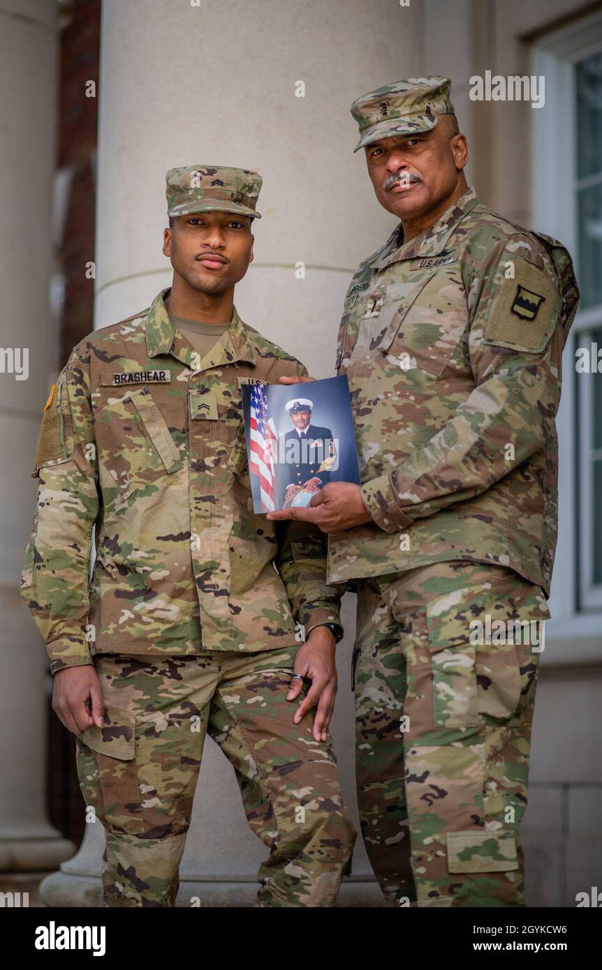 Chief Warrant Officer 4 Phillip Brashear (right), a U.S. Army Reserve command chief warrant ...