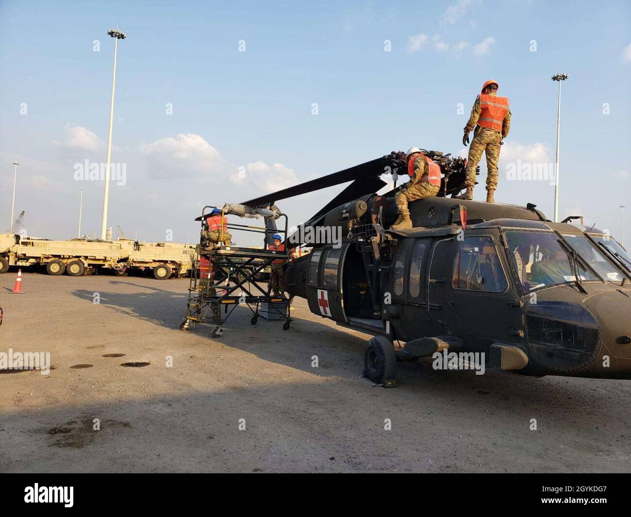 1107th TASMG Soldiers fold the rotor blades on a UH-60 Blackhawk ...