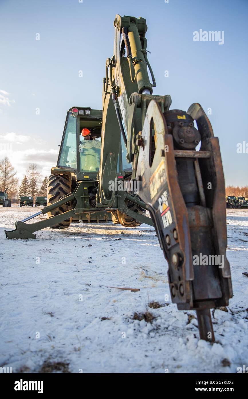 U.S. Marine Corps Lance Cpl. Juahvierh Simmons tests the hydraulic ...
