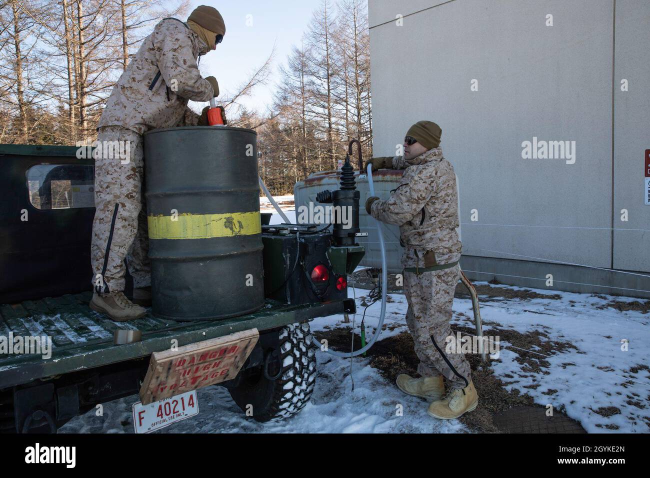 U.S. Marine Corps Staff Sgt. Justin Eckhart, left, and Staff Sgt. Paul ...
