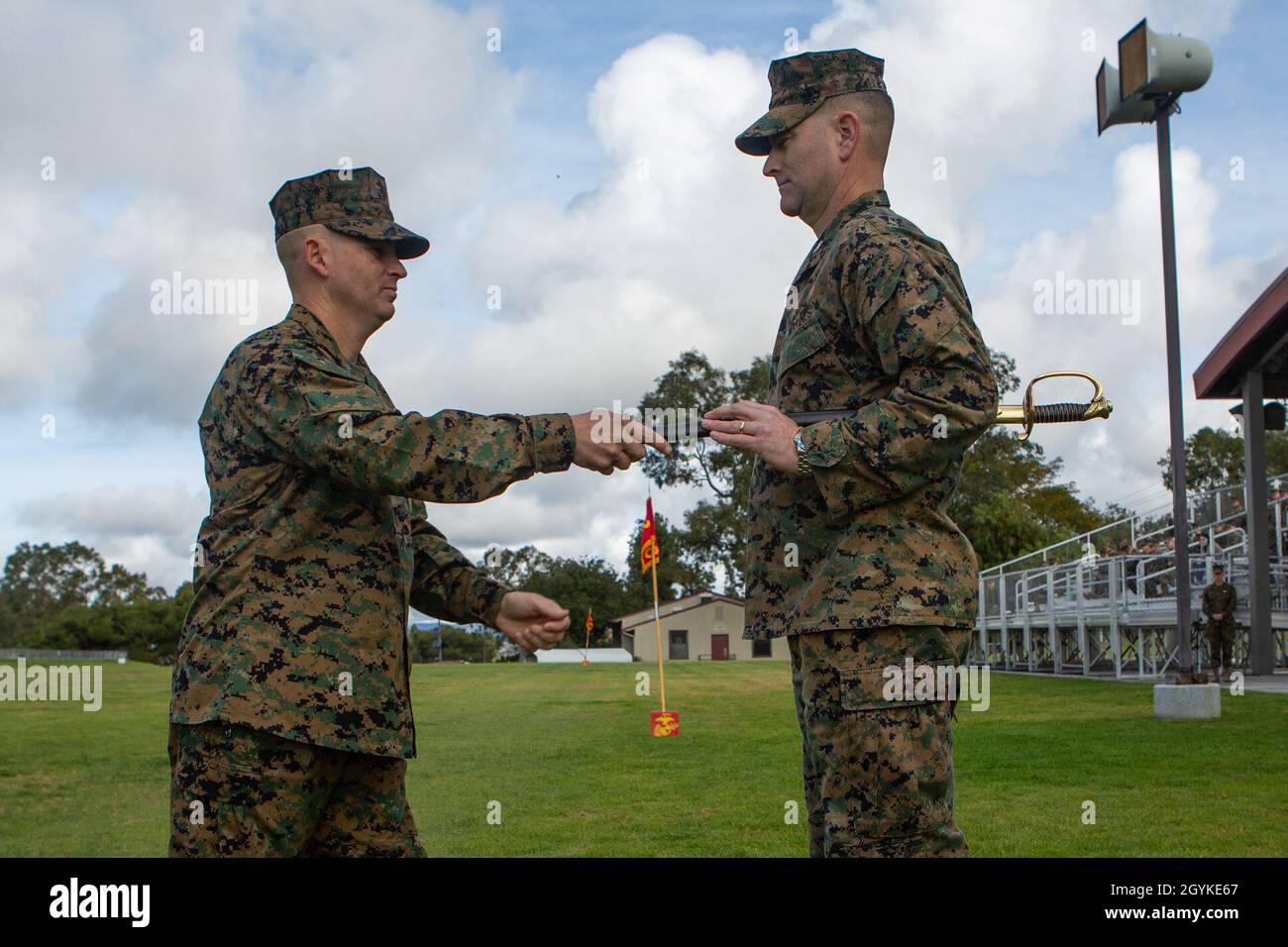 U.S. Marine Corps Sgt. Maj. Vernon E. Derby passes a noncommissioned ...