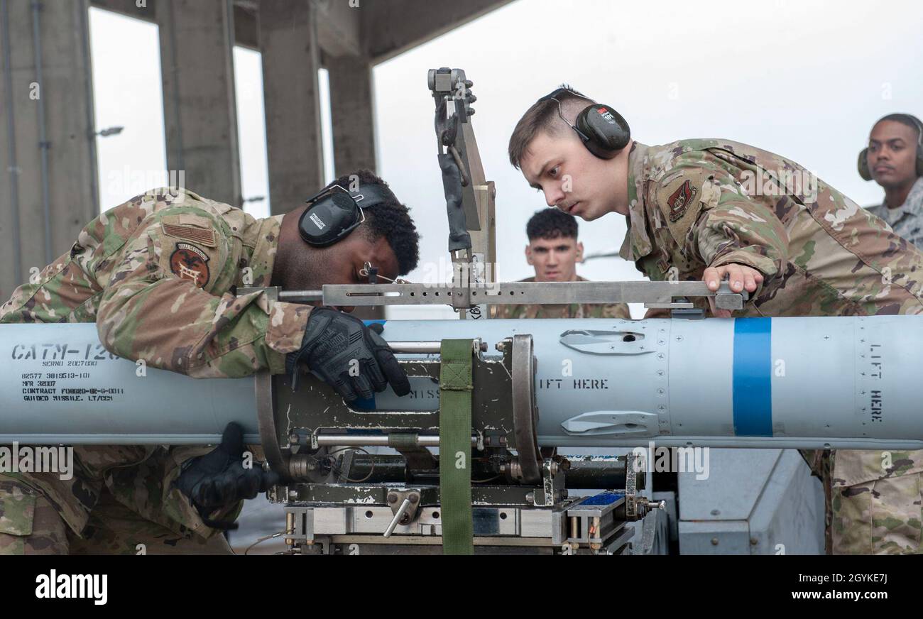 U.S. Air Force load crew members from the 44th Aircraft Maintenance ...