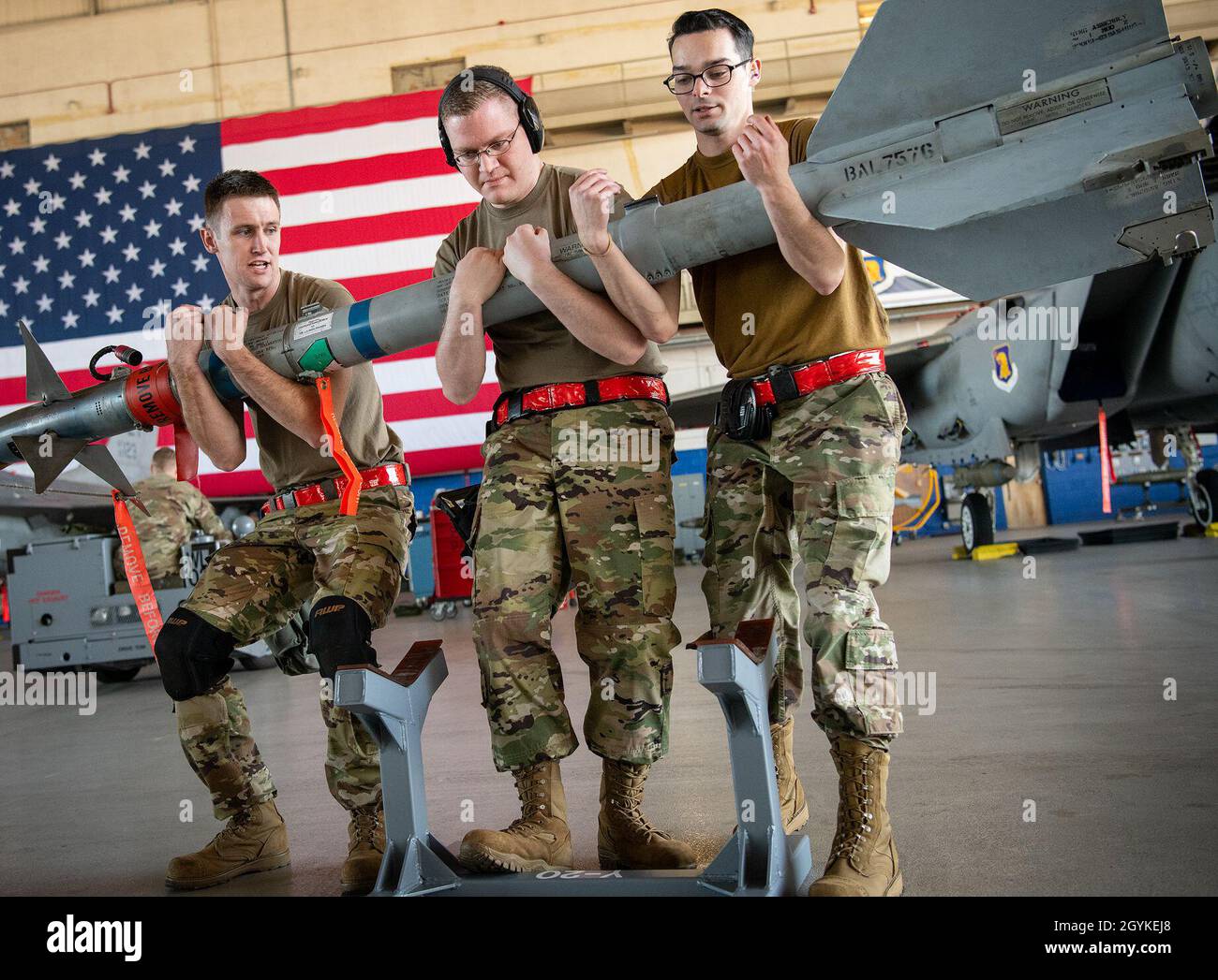The 96th Aircraft Maintenance Squadron Red team pick up an AIM-9 at the ...
