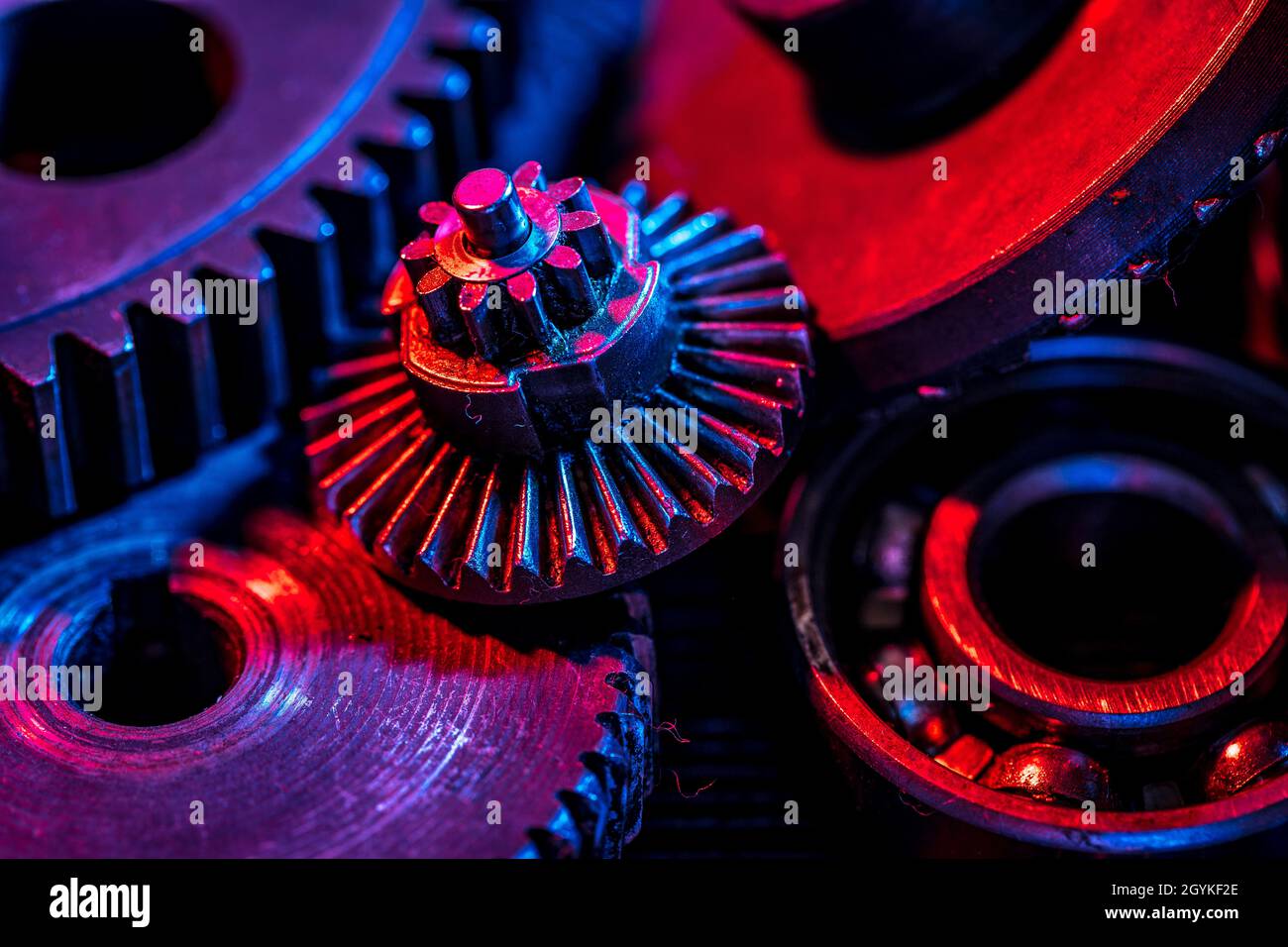 Gears. Machine part. Neon color Stock Photo - Alamy