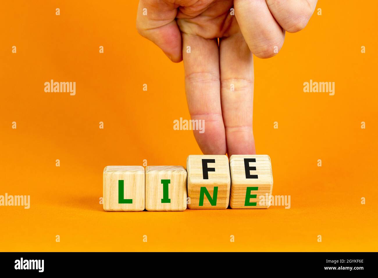 Lifeline, line of life symbol. Businessman hand turns cubes and changes ...