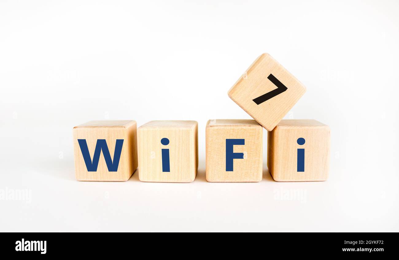 WiFi 7 symbol. The concept word WiFi 7 on wooden cubes. Beautiful white ...